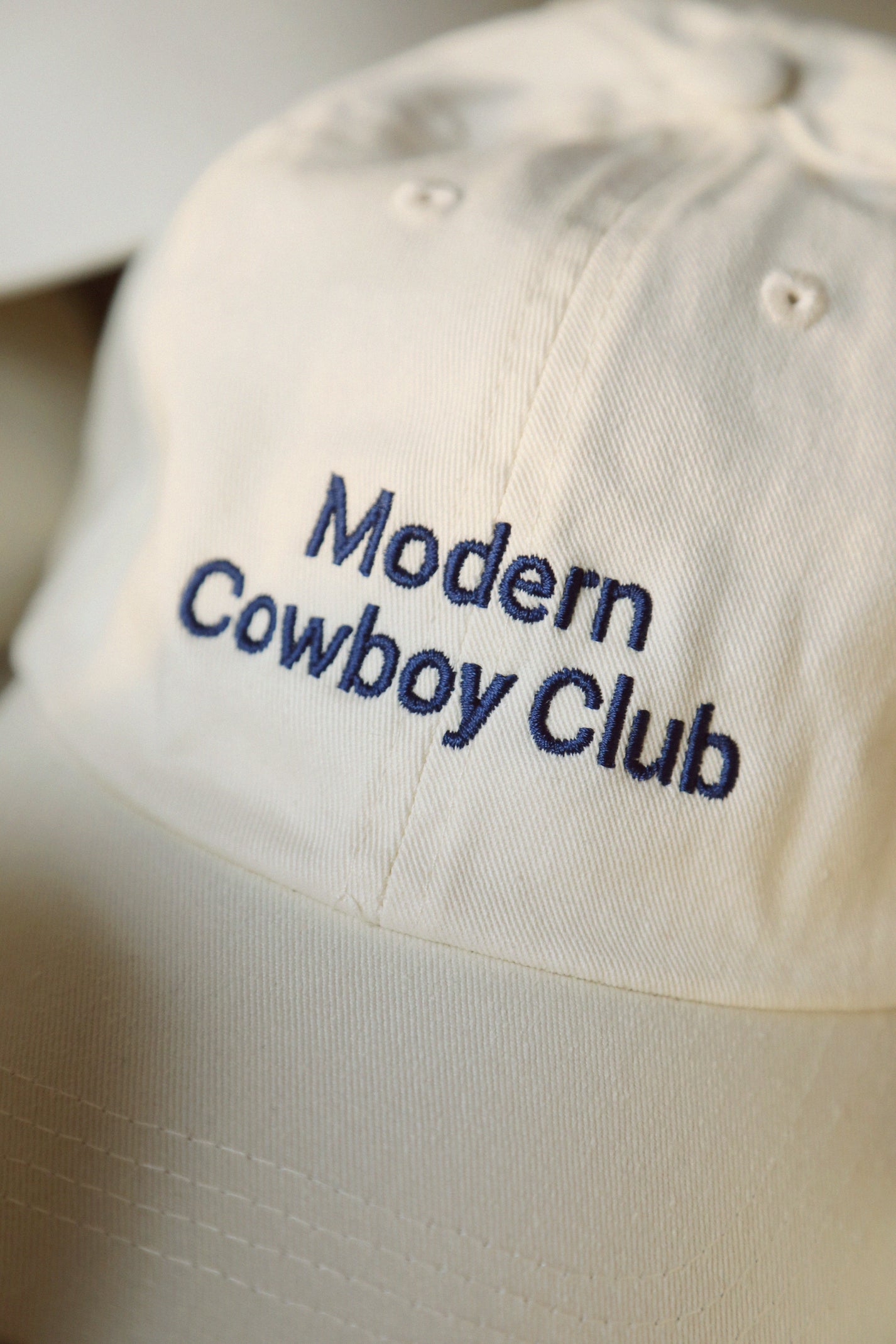 MCC Hat - Ivory & Blue Logo – moderncowboyclub